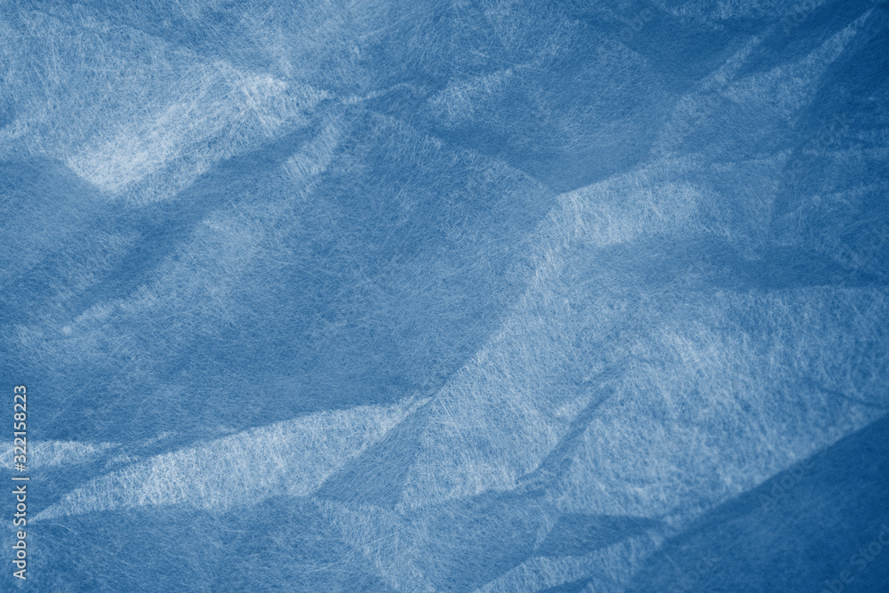 Classic blue crumpled wrapping paper background and texture. tender ...