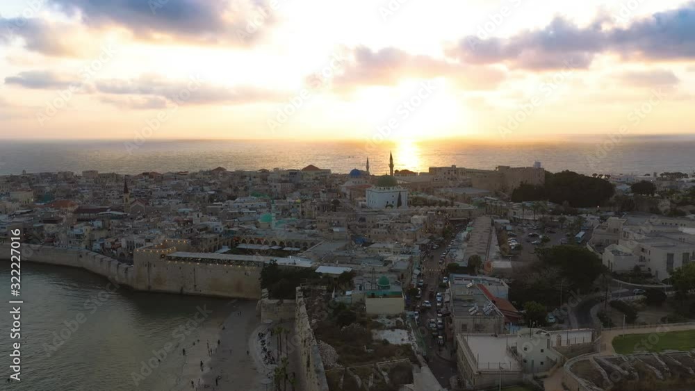 Aerial summer sunset fly over of Acco, Acre, Akko medieval old city ...