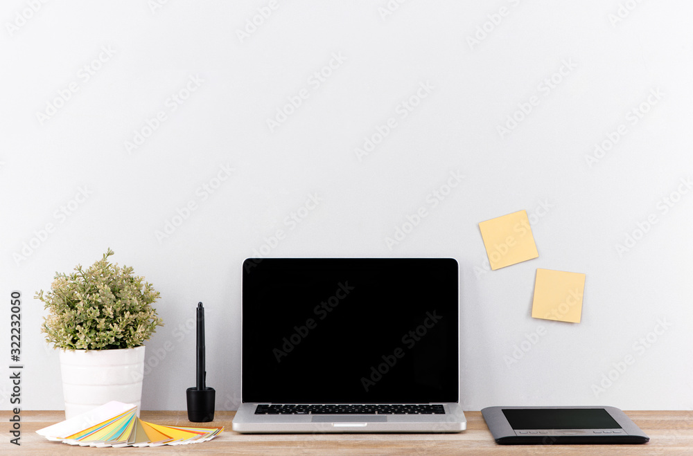 Mock up with two sticky notes with laptop open and office supplies ...