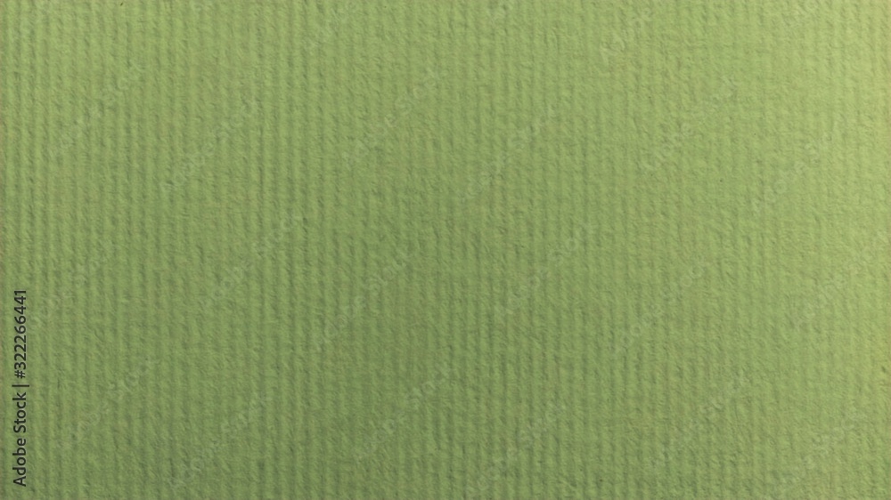 The cardboard is light green. Thick paper or cardboard texture ...