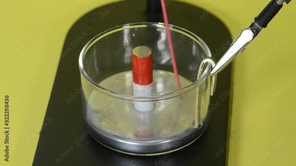 Faraday motor with mercury pool and a conducter that moves in circles ...