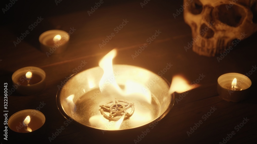 Burning pentacle on altar closeup photo Stock Photo | Adobe Stock