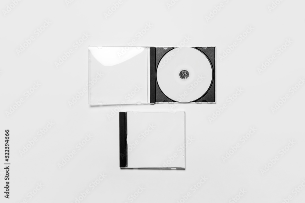 Open and closed compact plastic disc box case with white isolated blank ...