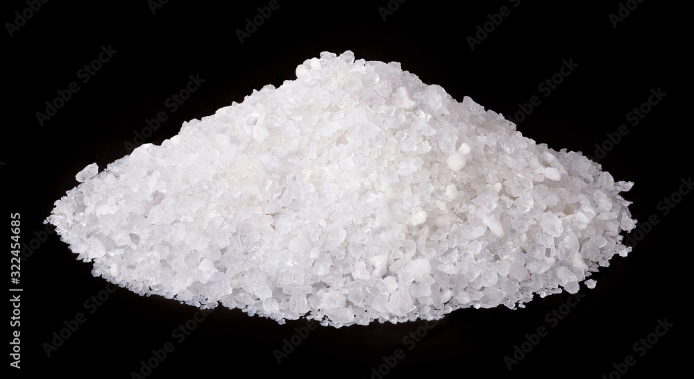 Pile of sea salt isolated on black background. Stock Photo | Adobe Stock