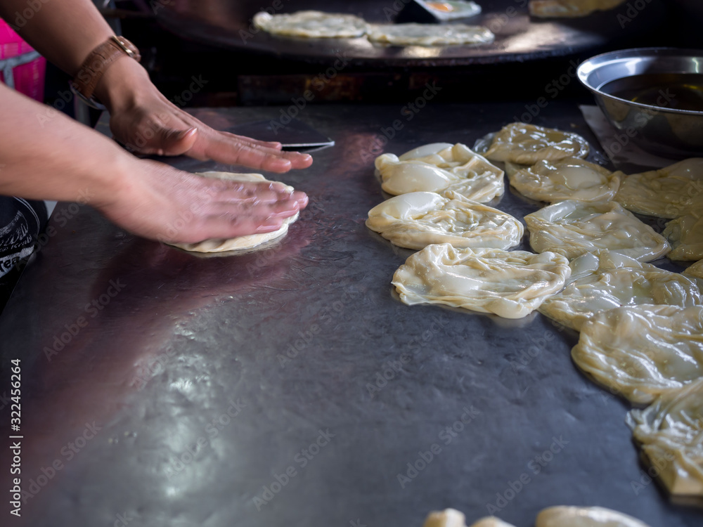 Roti Making, roti thresh flour by roti maker with oil. Indian ...