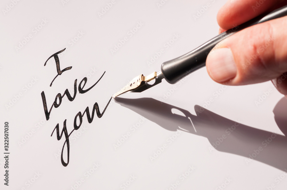 Romantic I Love You message handwritten in black ink with a calligraphy ...