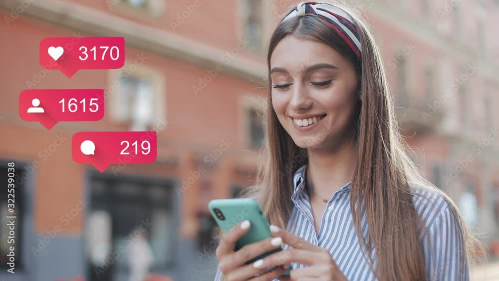 Cute woman wearing using app on smartphone standing on the old city ...