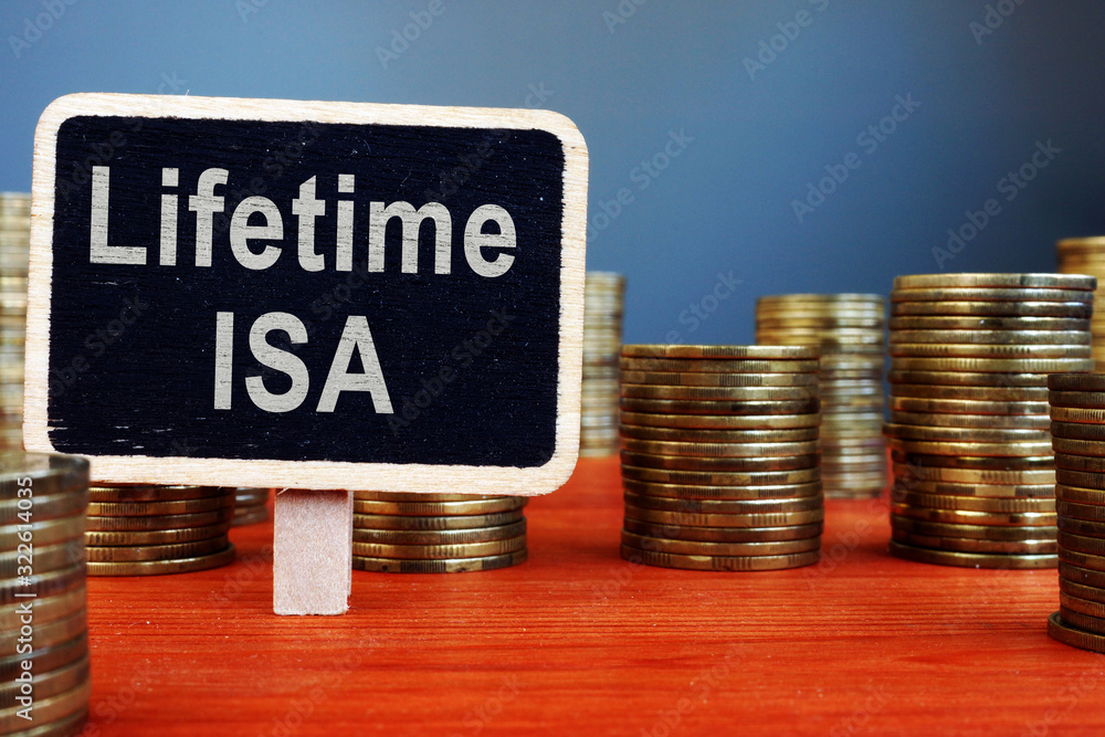 Lifetime ISA Individual Savings Account sign and coins. Stock Photo ...