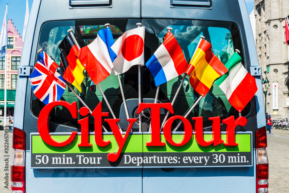 Tour bus full of flags of various countries Stock Photo | Adobe Stock