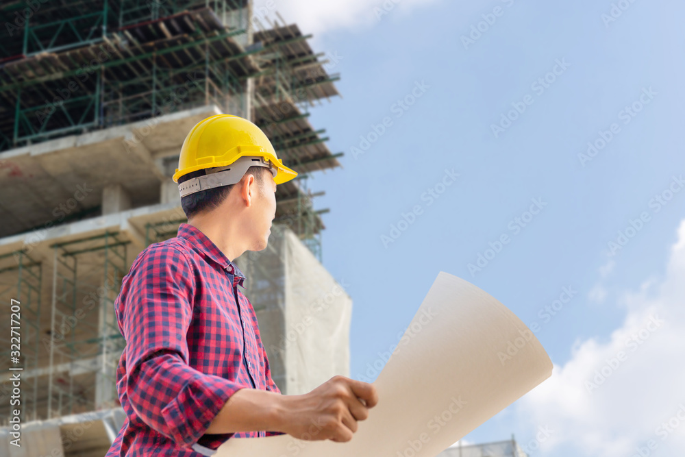 Engineer man with clipping path checking and planning project at ...