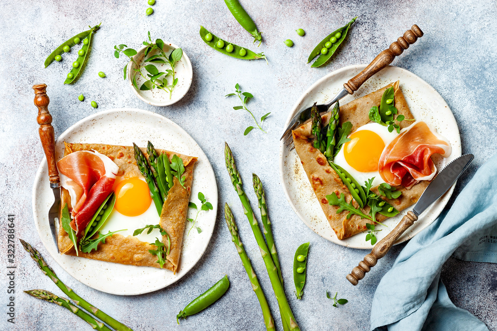 Buckwheat crepes, galette bretonne with asparagus, egg, green pea ...
