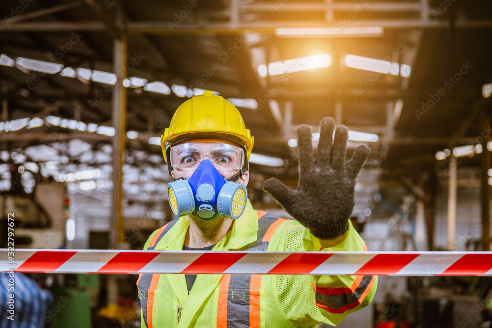 Engineer industry wearing safety uniform ,black gloves and gas mask ...