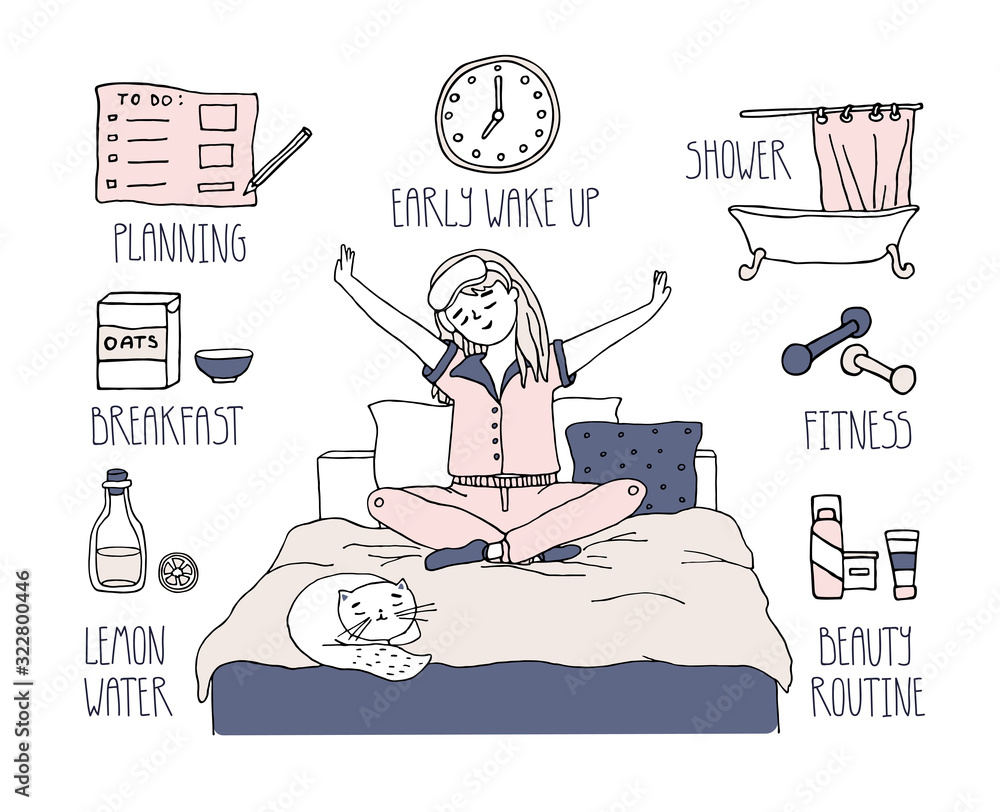 A young girl sitting on the bed with a cute cat and palanning her ...