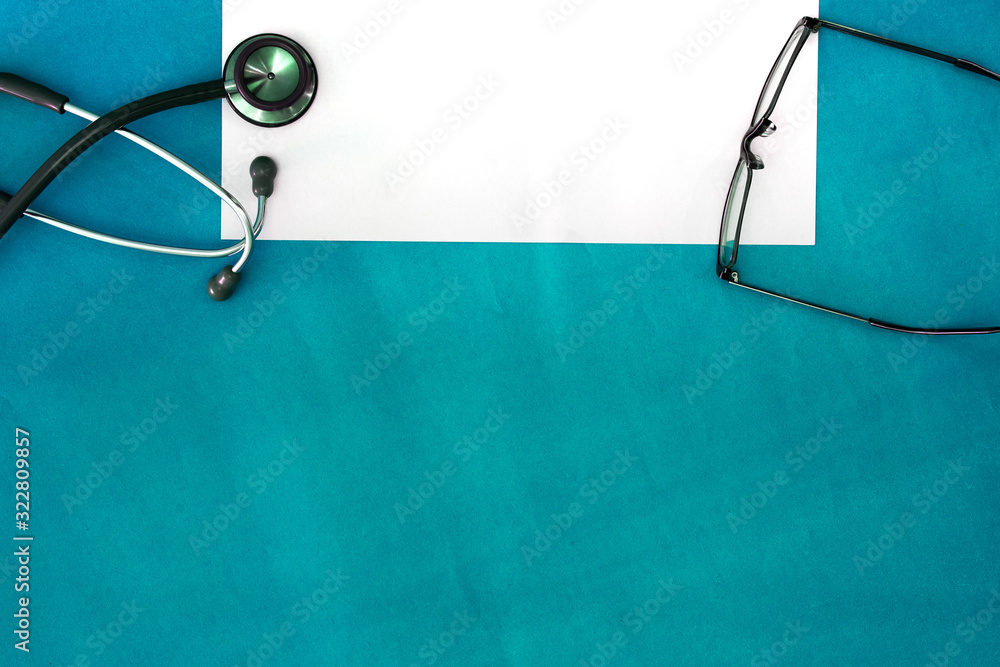 Mock up and doctor glasses,stethoscope on green surgery background in ...