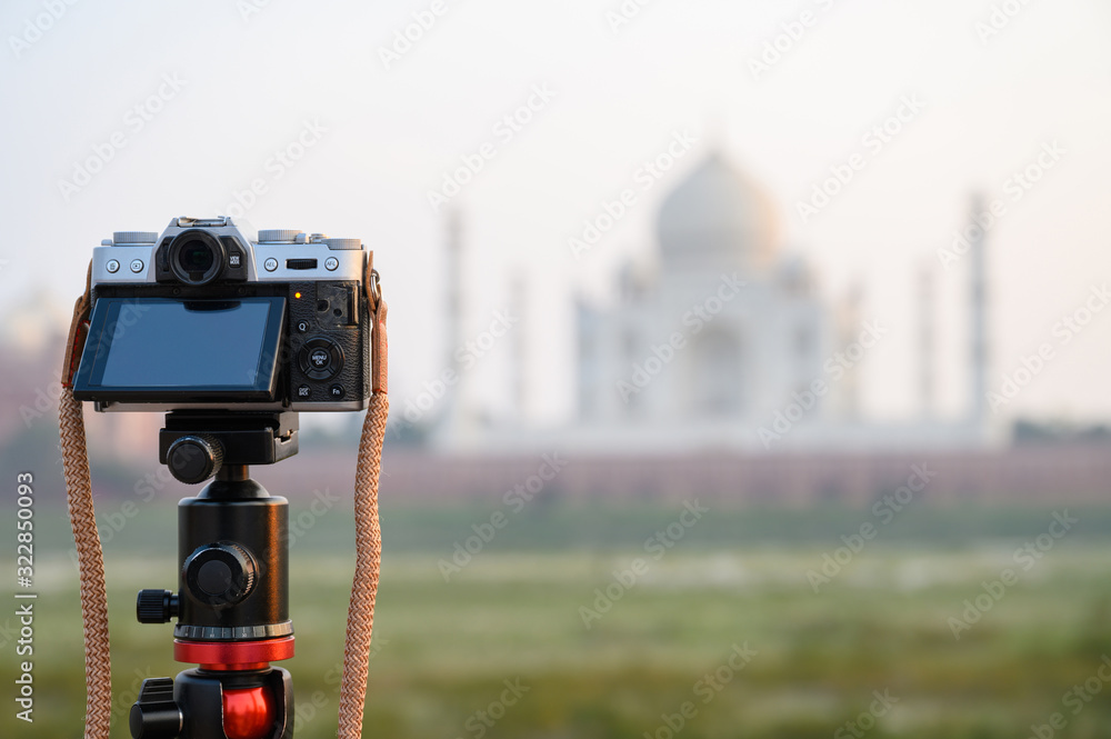 Explore India, Digital camera on tripod capturing photo of Taj Mahal in ...