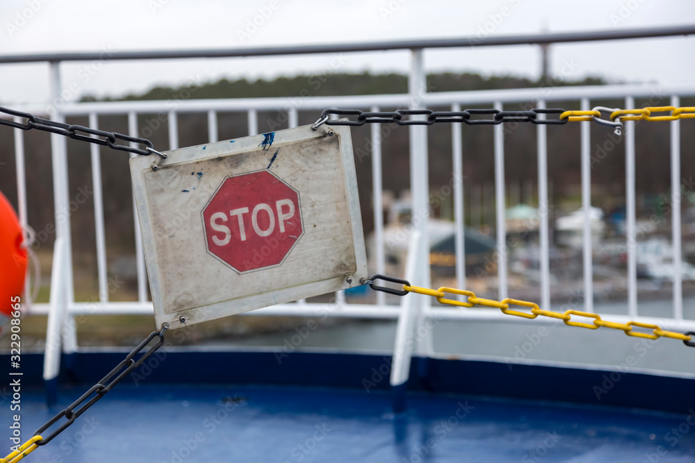 Prohibition sign STOP in front of a guard on a ship Stock Photo | Adobe ...