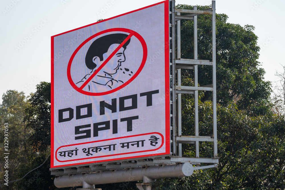 Light up sign reminding tourists not to spit in the stadium (Do not ...