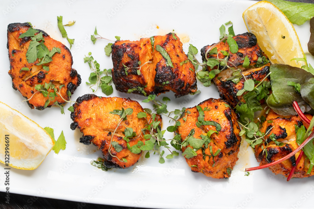 Indian food - chicken tikka with herbs Stock Photo | Adobe Stock