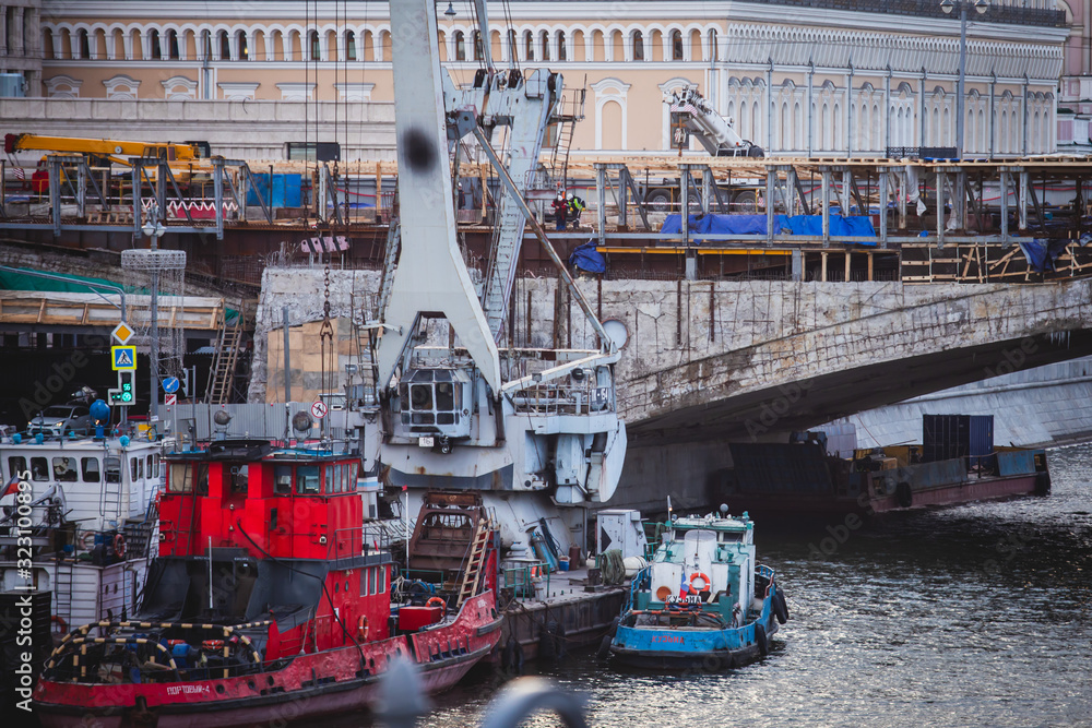 Process of repairing the massive bridge with construction pontoon barge ...