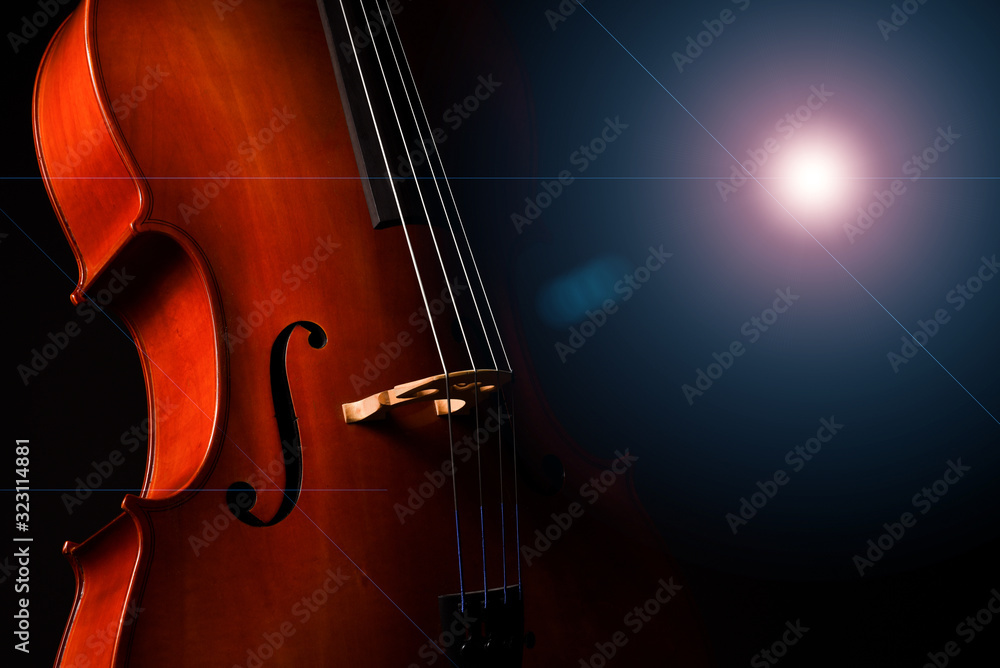 Cello isolated on black background with blue spotlight Stock Photo ...