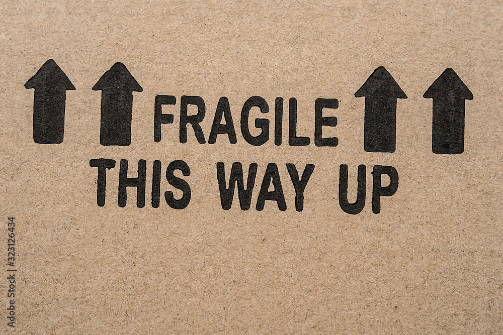 Traditional black FRAGILE THIS WAY UP cardboard box stamp. Stock Photo ...