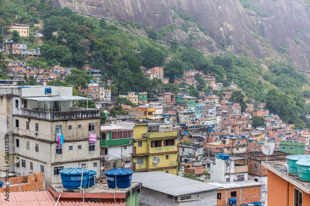 Rocinha favela, also known as a slum or shanty town, built on a steep ...