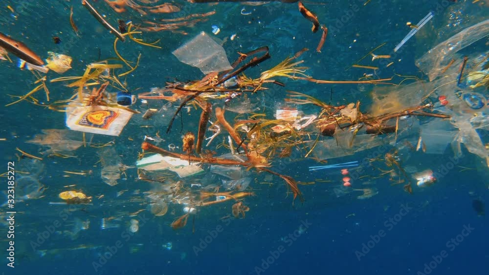 Trash in sea water, plastic pollution problem in tropical waters of ...