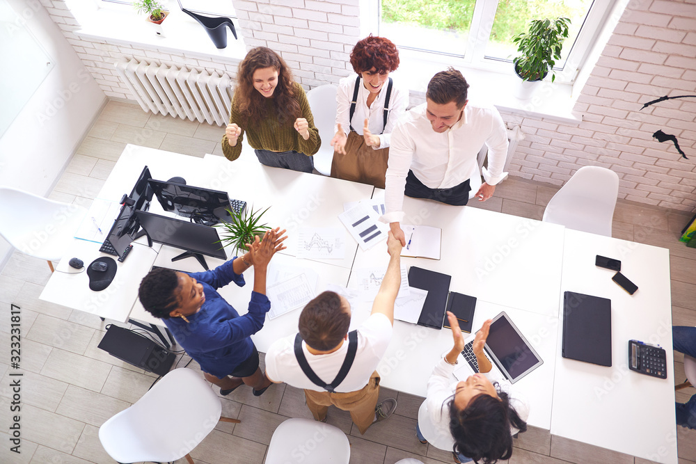 Good job of successful business team after meeting sit around table ...