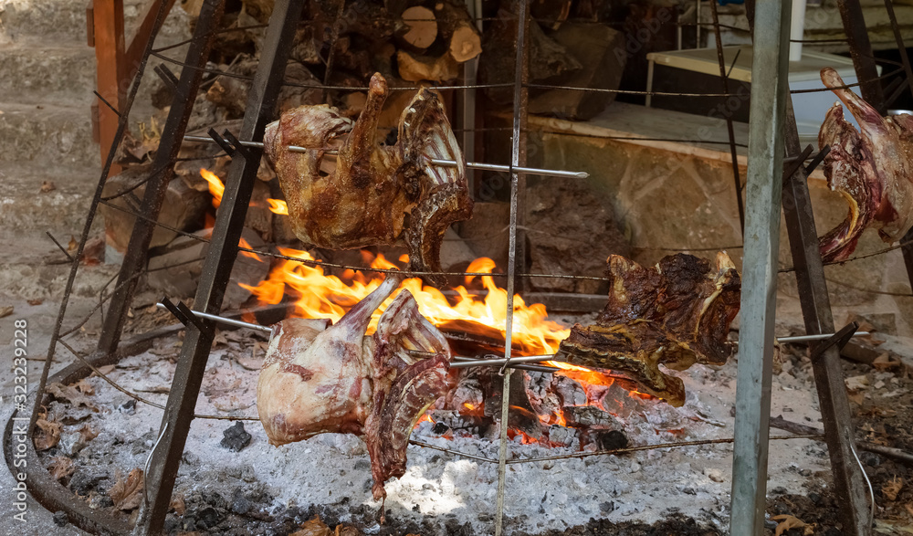 Antikristo, a traditional roasted lamb or goat meat, Crete (Greece ...