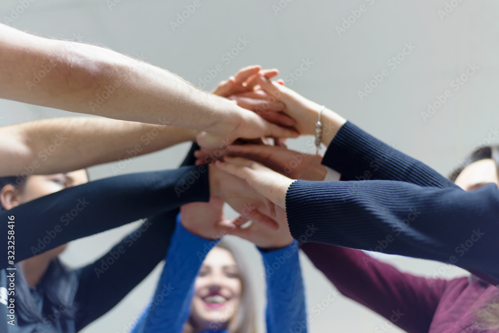 Young business people Teamwork Stacking Hand Concept. Close up of young ...
