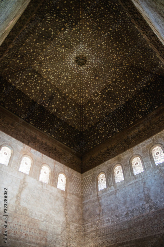 Arabic architectural details in columns and arches of a mosque or an ...