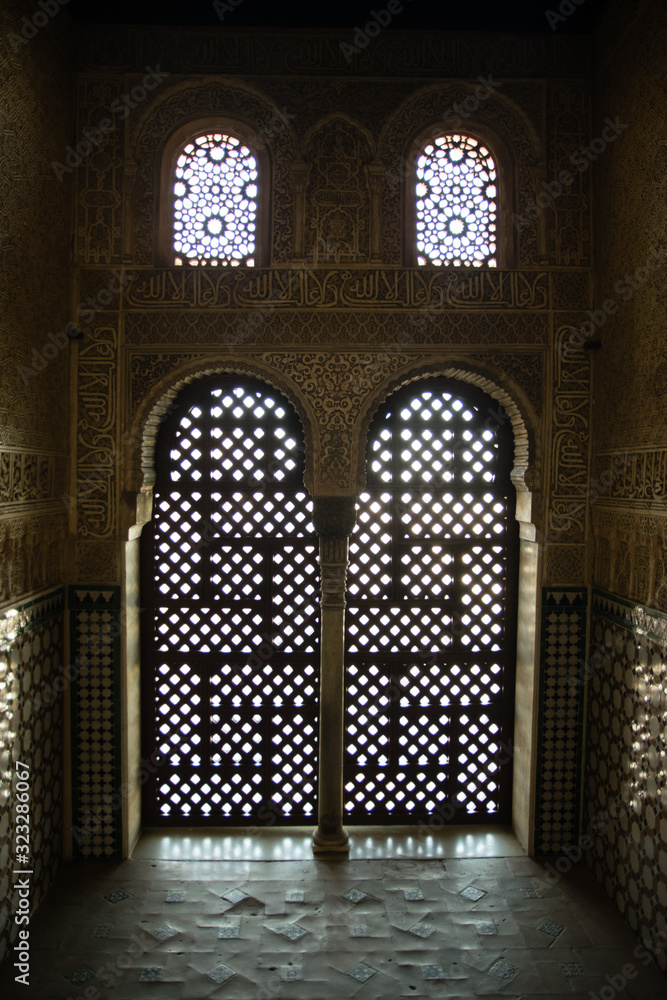 Arabic architectural details in columns and arches of a mosque or an ...