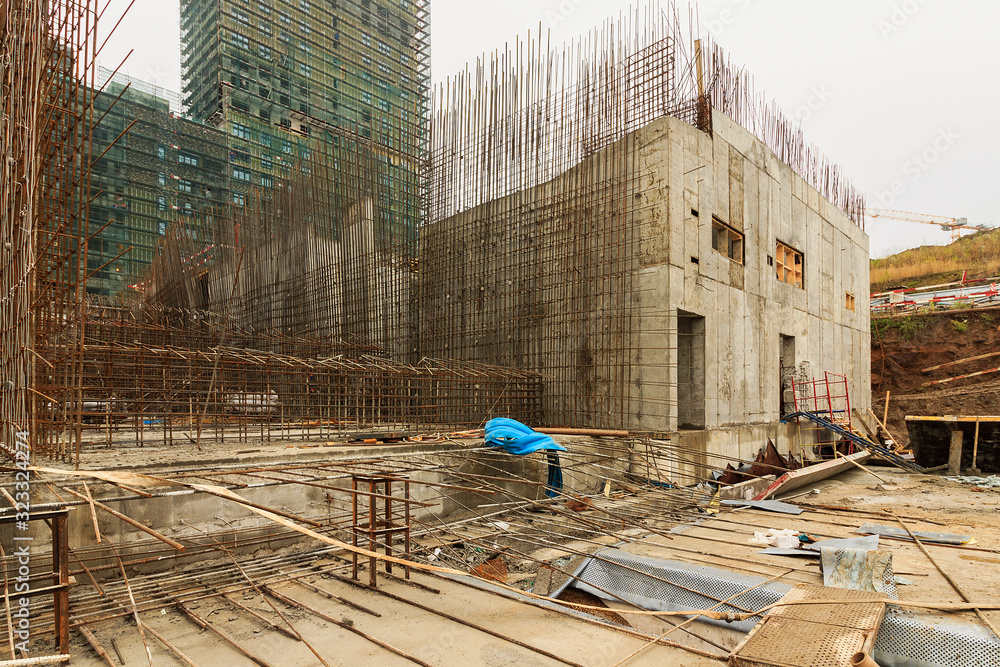 Bar bender fixing steel reinforcement for house concrete floor slab ...