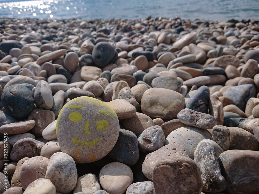 Sea background and pebbles. Sea pebbles on the beach. Natural sea ...