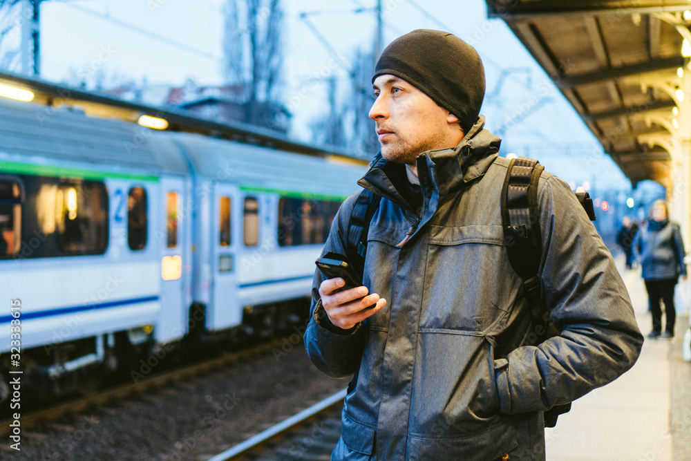 Sopot Fast Urban Railway station. young man standing and waiting train ...