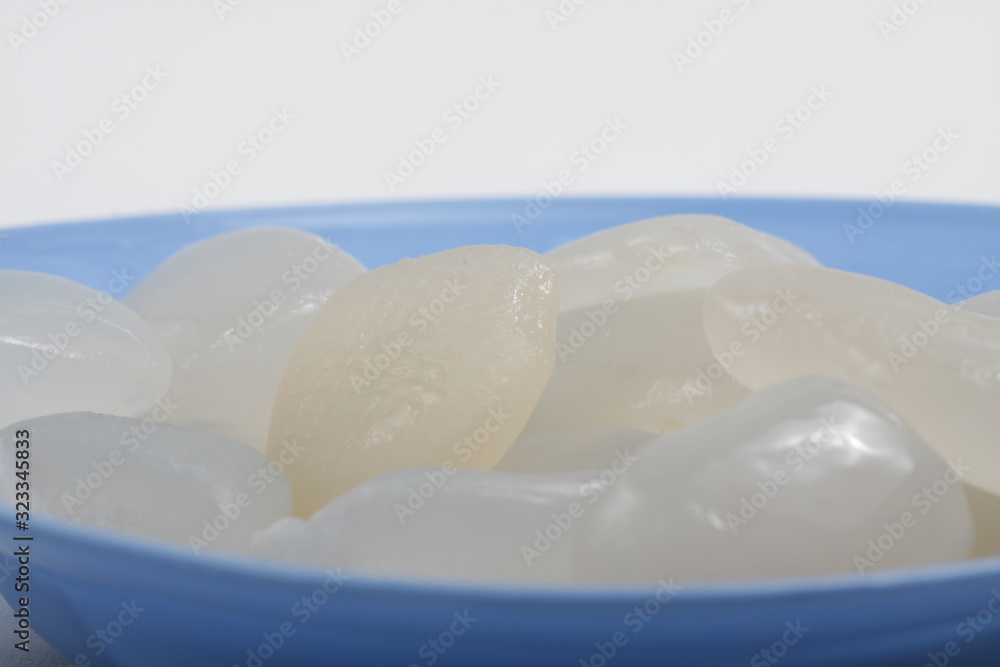Macro shot of "kolang kaling", fruit of "aren tree" / Arenga pinnata, a ...