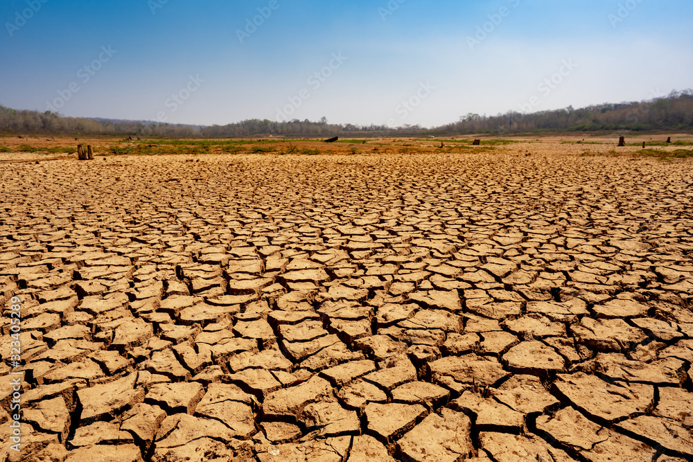 cracked earth from arid drought weather in dam or river, hot summer ...