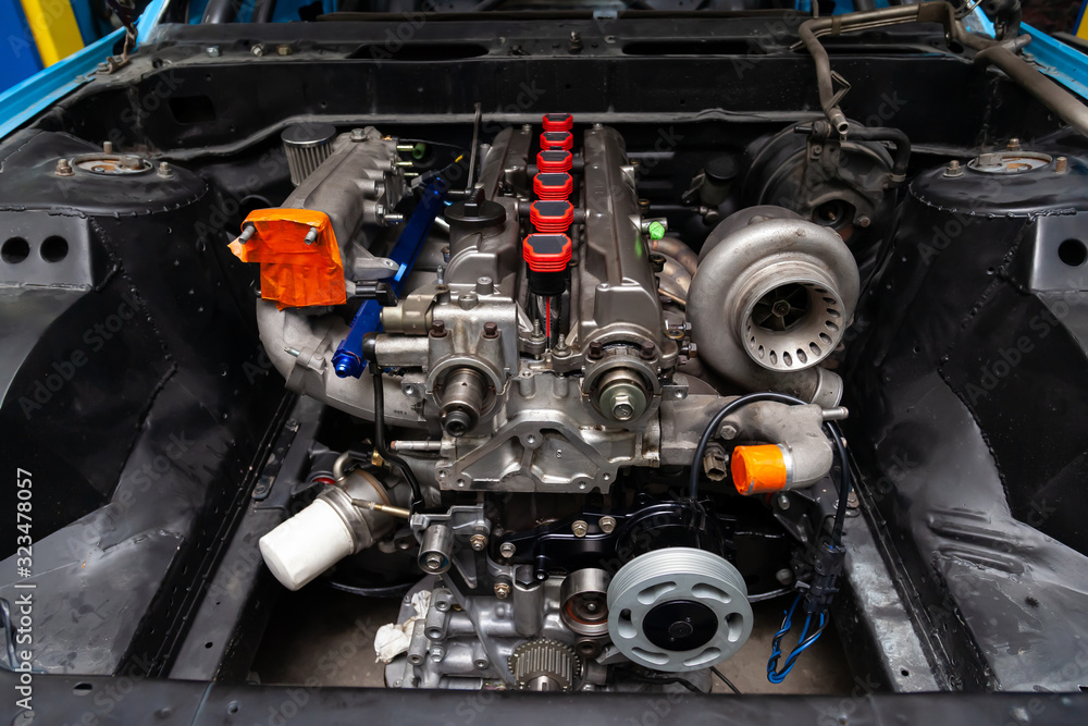 Powerful tuned gasoline engine with a turbocharger and a charger in the ...