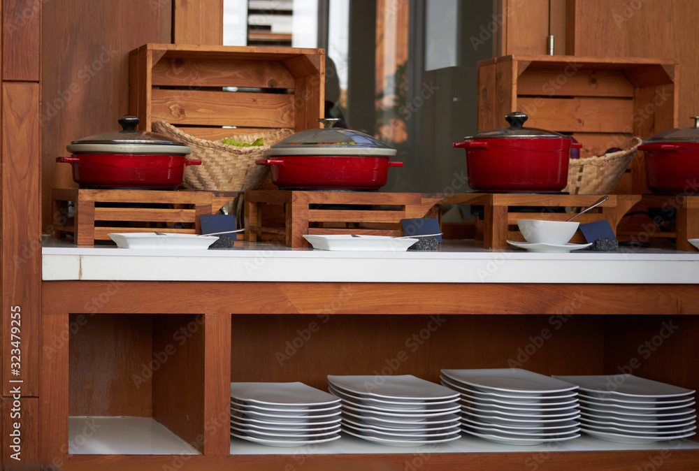 pots with mock up labels with food for buffet meal morning and plates ...