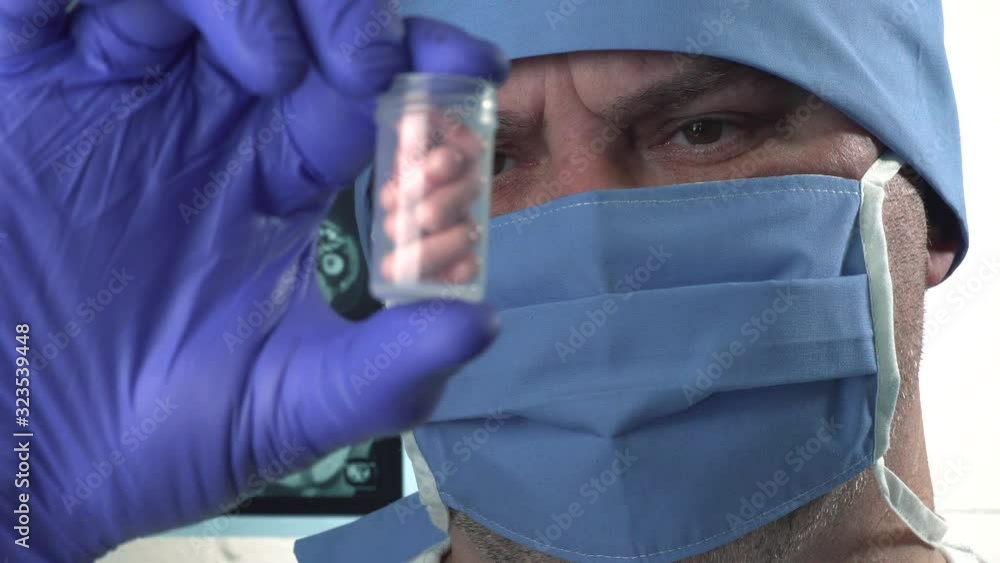 laboratory employee working on new medication project and studying ...