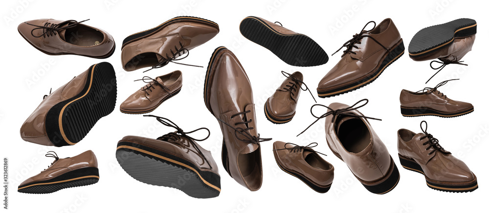 Set of brown patent leather shoes in different positions and angles ...