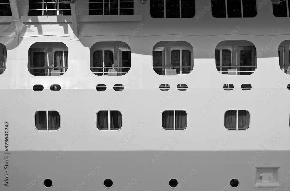 Side view and close up detail of windows and balcony cabins of modern ...