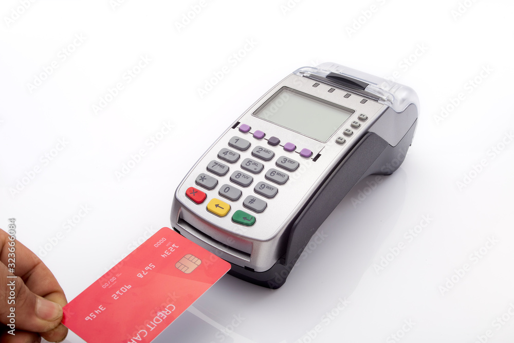 Credit card and pos terminal on white Stock Photo | Adobe Stock