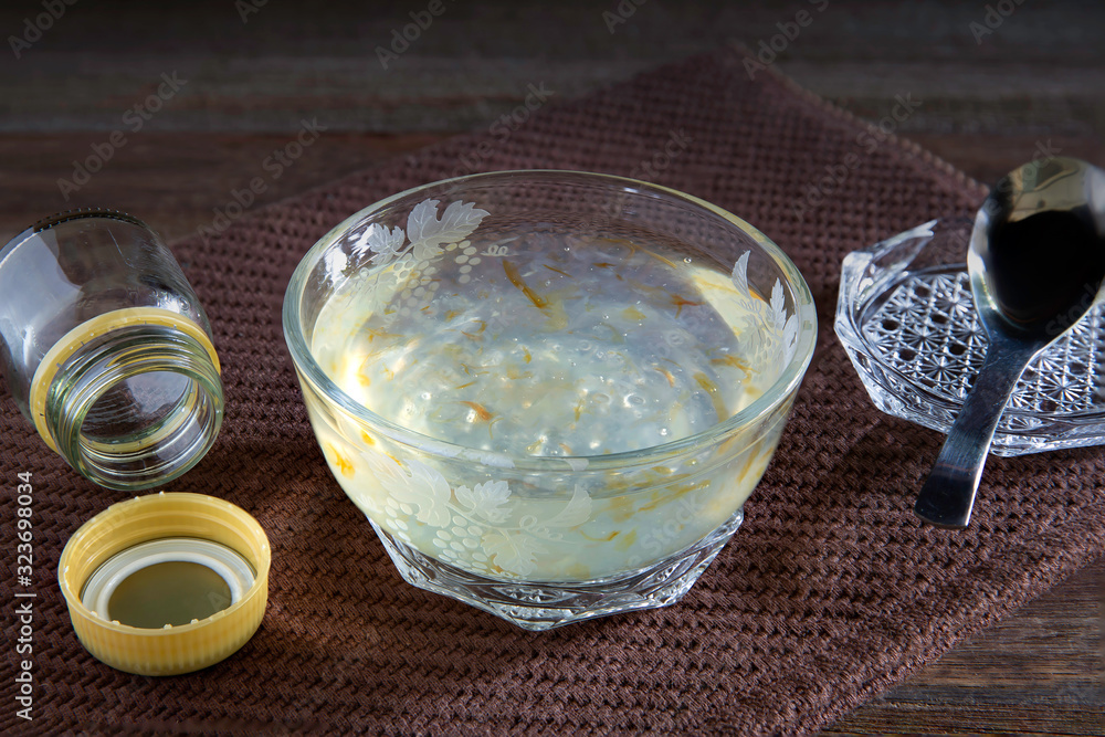 Bird's nest food in glass bowl clear on dark brown apron Stock Photo ...
