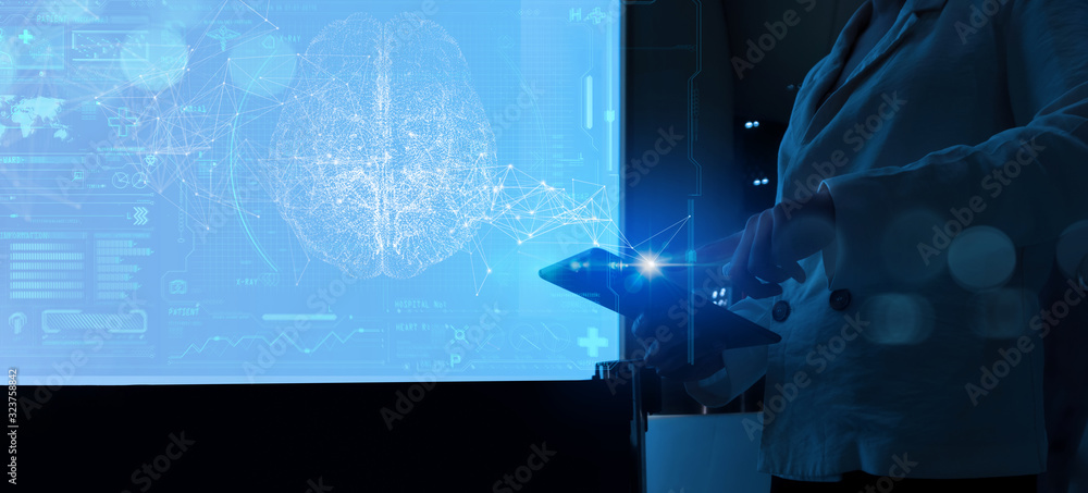 Female Doctor surgeon analyzing patient brain with human anatomy on ...