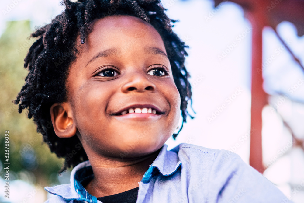 Big real smile from young happy black afro boy - playful kids have fun ...