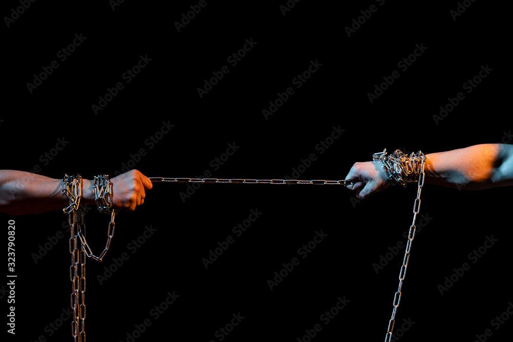 Slavery. Hands in chains. Freedome concept. International day for the ...