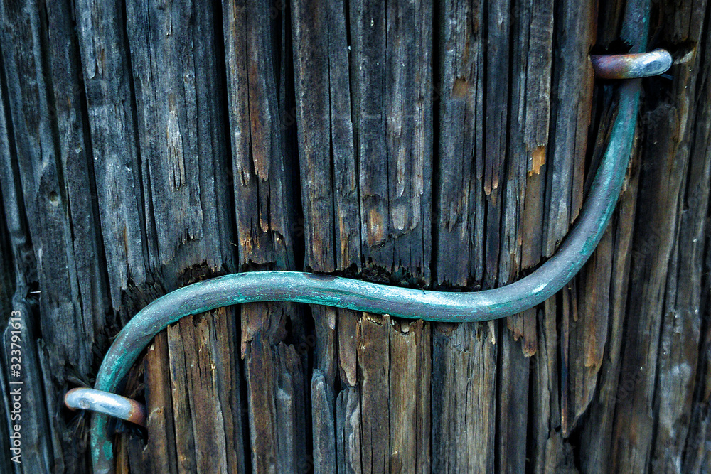 Copper ground wire on utility pole in Upstate NY Stock Photo | Adobe Stock