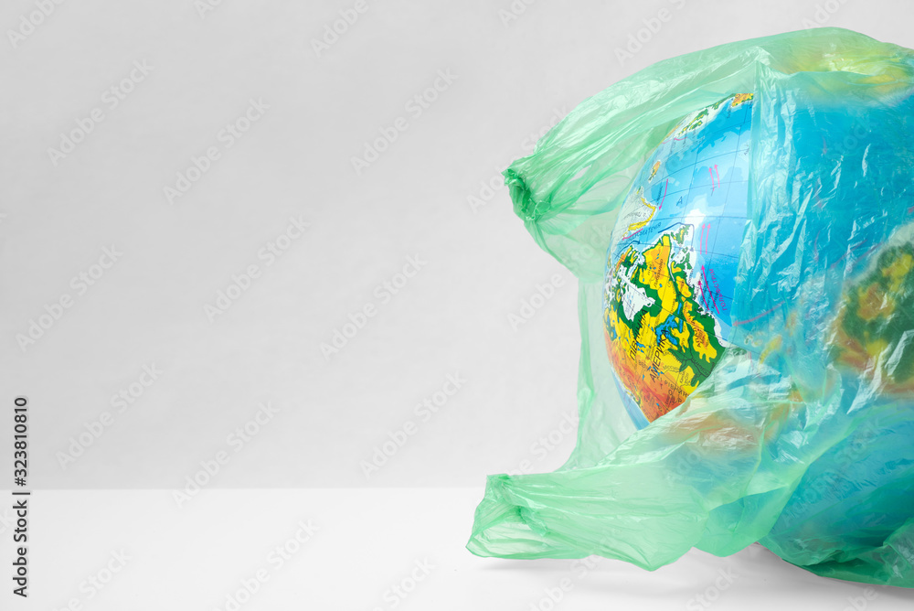 Earth planet in a plastic, eco no plastic concept, globe in plastic ...