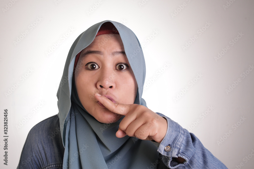 Muslim Lady Shushing Gesture Stock Photo | Adobe Stock